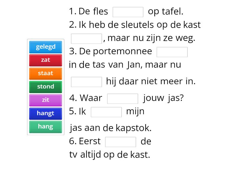 hangen, liggen, zitten, staan oef 2 - Complete the sentence